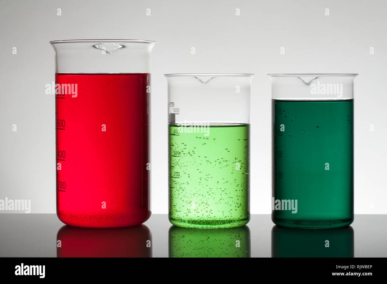Liquid in laboratory bottles. Scientific biochemical laboratory ...