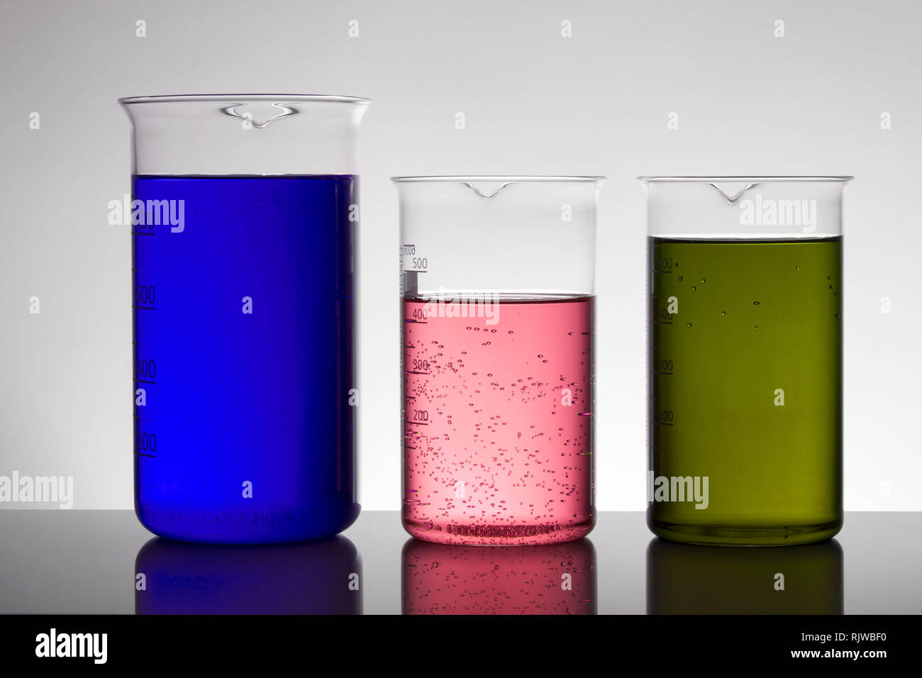 Liquid in laboratory bottles. Scientific biochemical laboratory ...