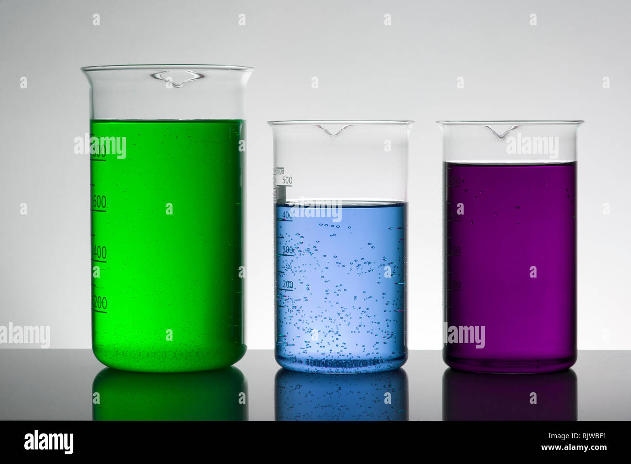 Liquid in laboratory bottles. Scientific biochemical laboratory ...