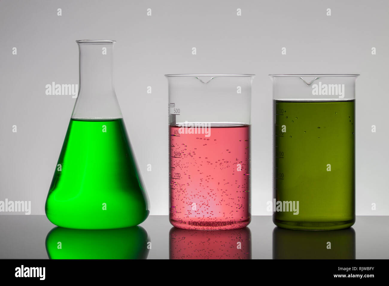 Liquid in laboratory bottles. Scientific biochemical laboratory ...