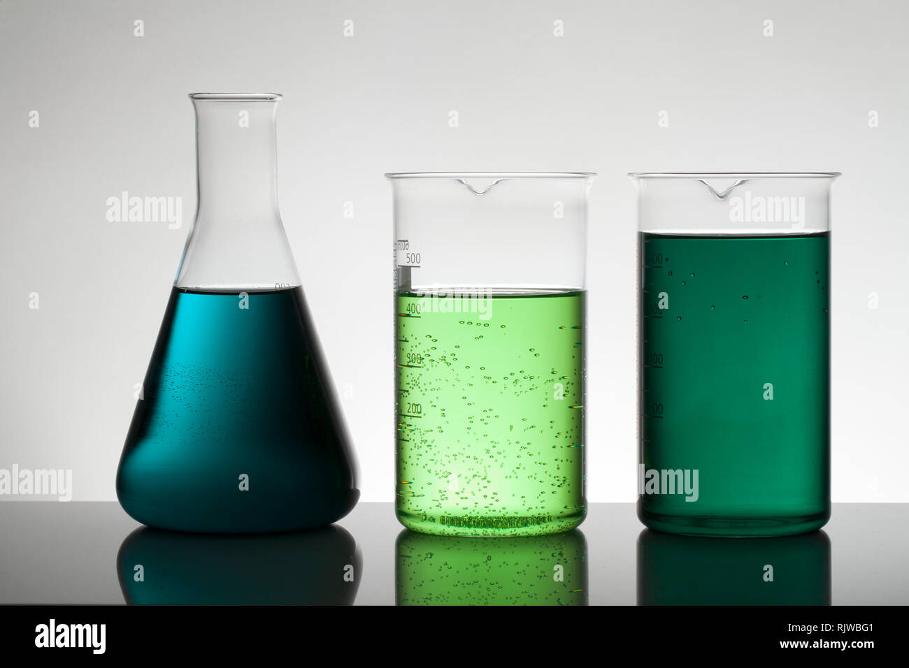 Liquid in laboratory bottles. Scientific biochemical laboratory ...