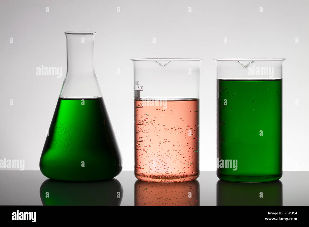 Liquid in laboratory bottles. Scientific biochemical laboratory ...