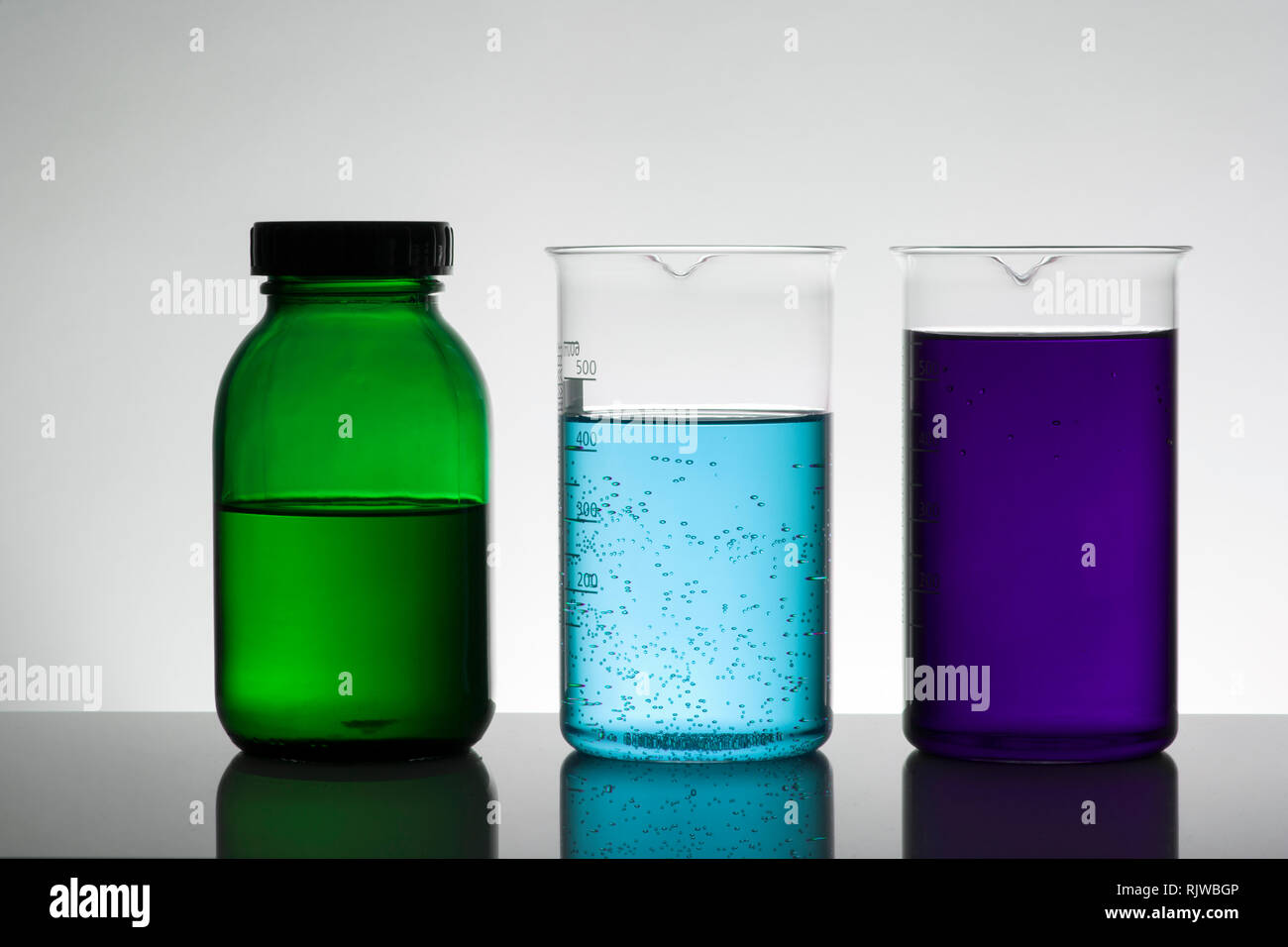 Liquid in laboratory bottles. Scientific biochemical laboratory ...