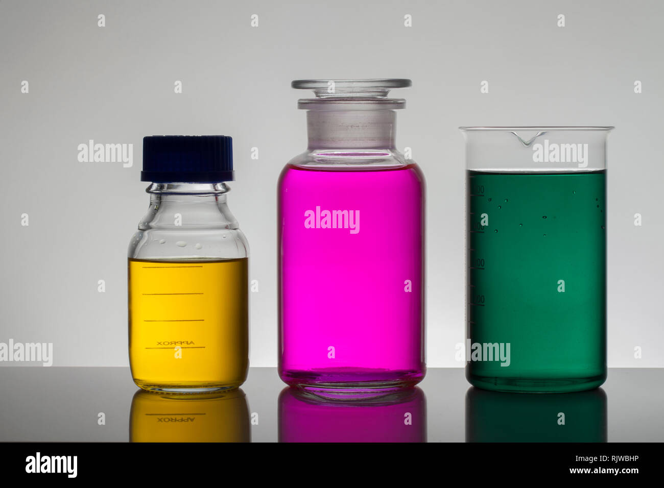 Liquid in laboratory bottles. Scientific biochemical laboratory ...