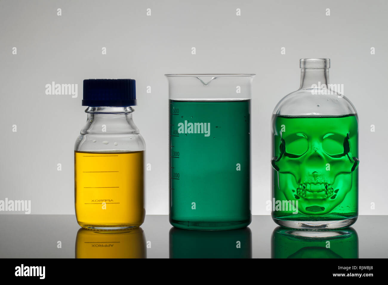 Liquid in laboratory bottles. Scientific biochemical laboratory ...