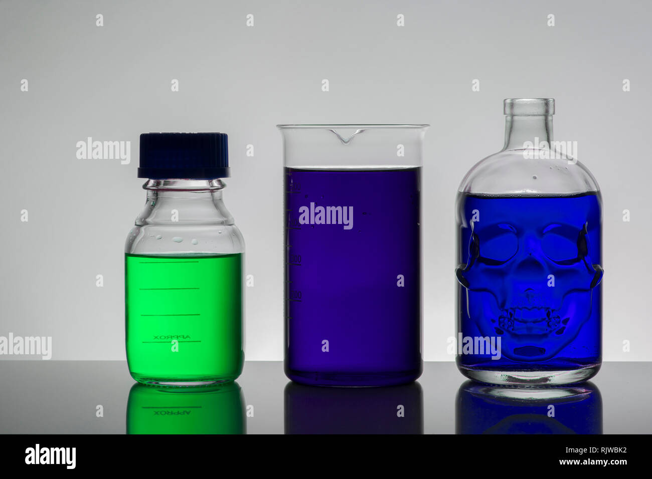 Liquid in laboratory bottles. Scientific biochemical laboratory ...