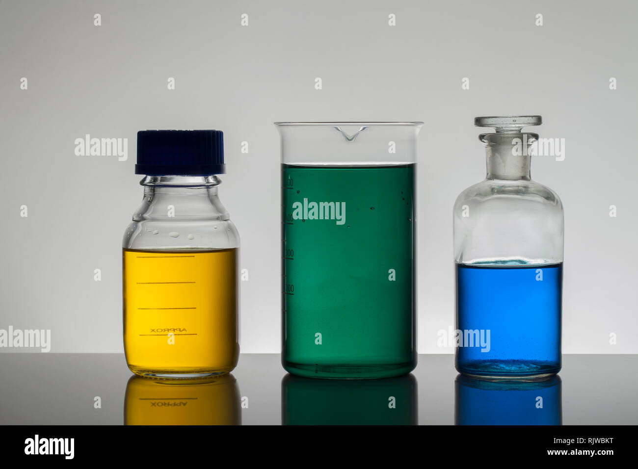 Liquid in laboratory bottles. Scientific biochemical laboratory ...