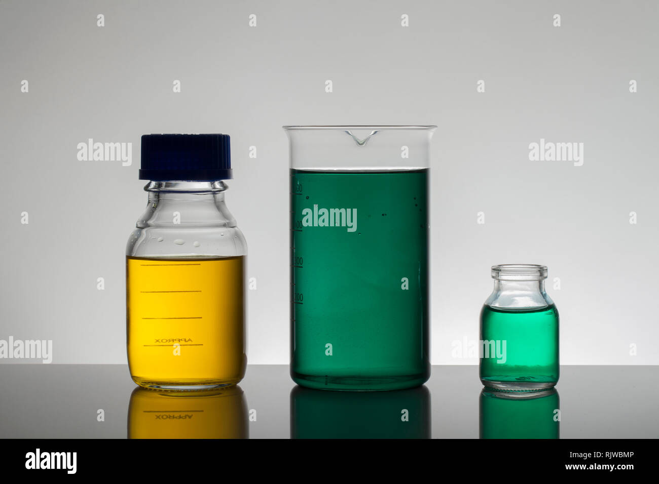 Liquid in laboratory bottles. Scientific biochemical laboratory ...