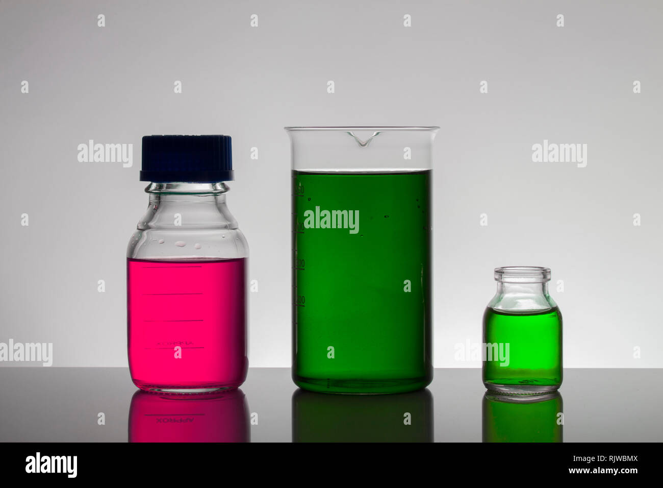 Liquid in laboratory bottles. Scientific biochemical laboratory ...