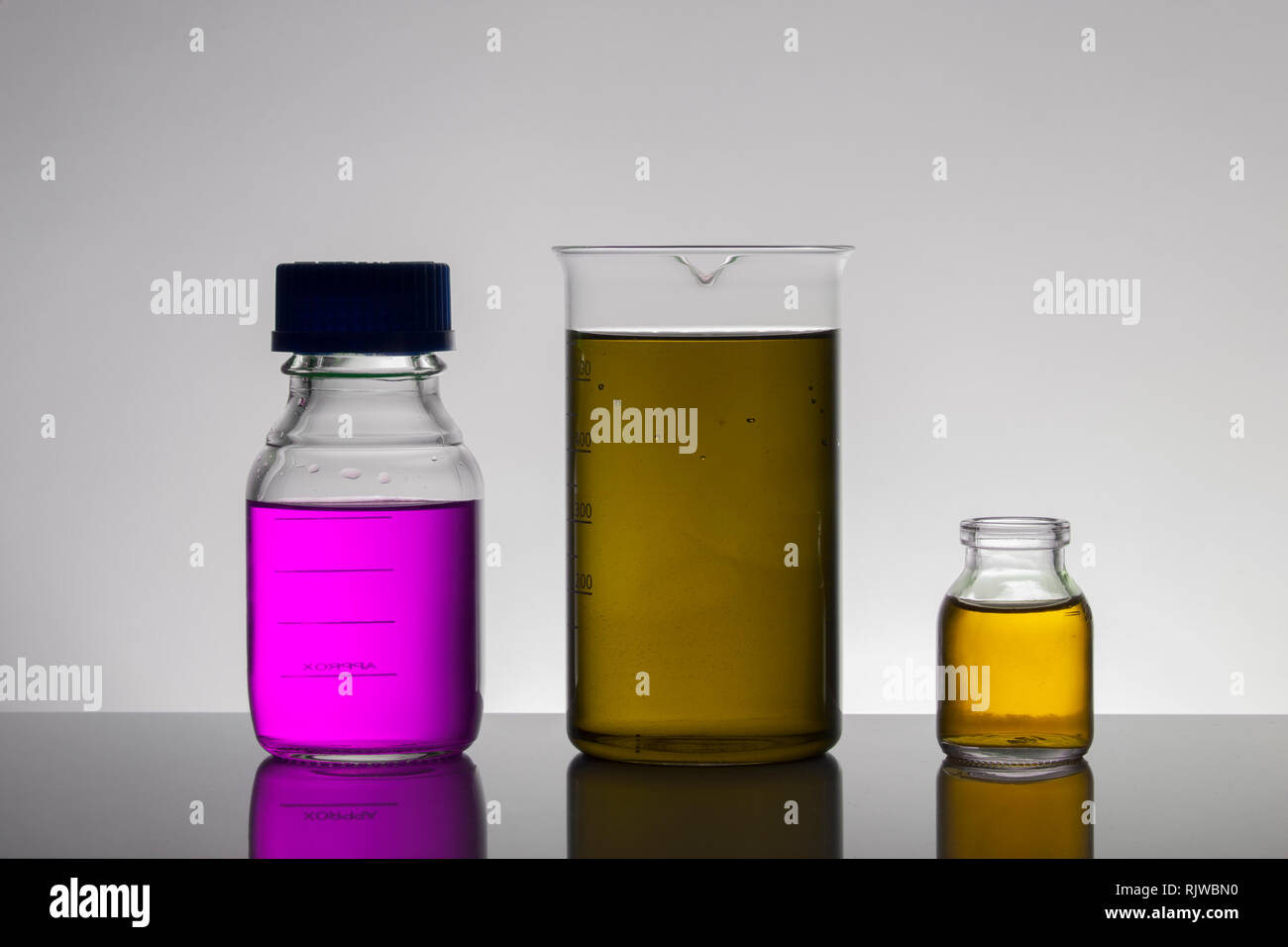 Liquid in laboratory bottles. Scientific biochemical laboratory ...
