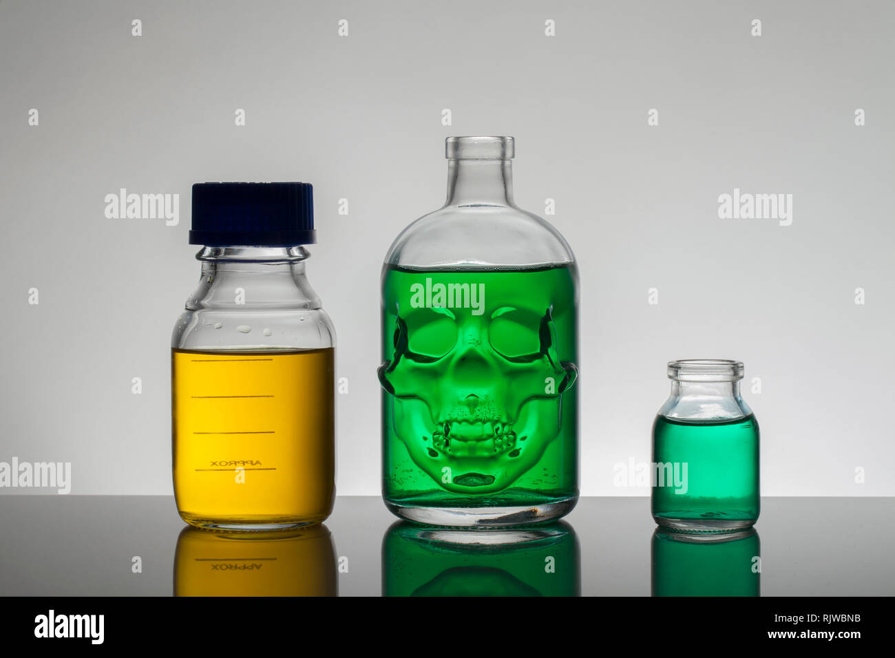Liquid in laboratory bottles. Scientific biochemical laboratory ...