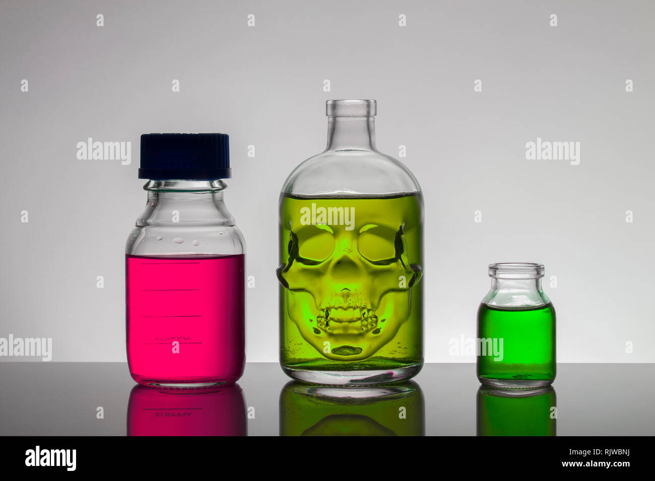 Liquid in laboratory bottles. Scientific biochemical laboratory ...