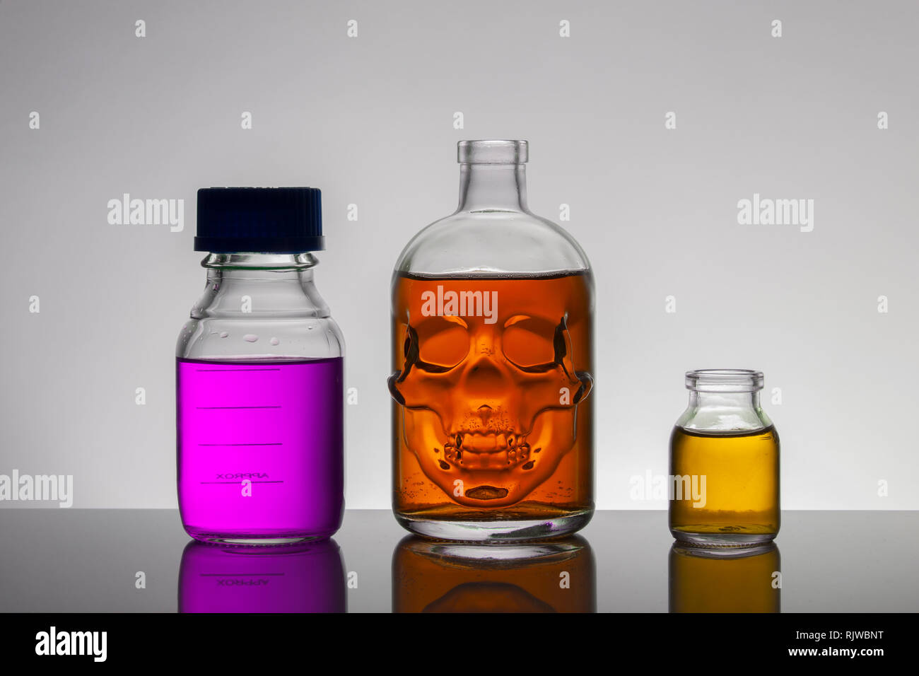 Liquid in laboratory bottles. Scientific biochemical laboratory ...