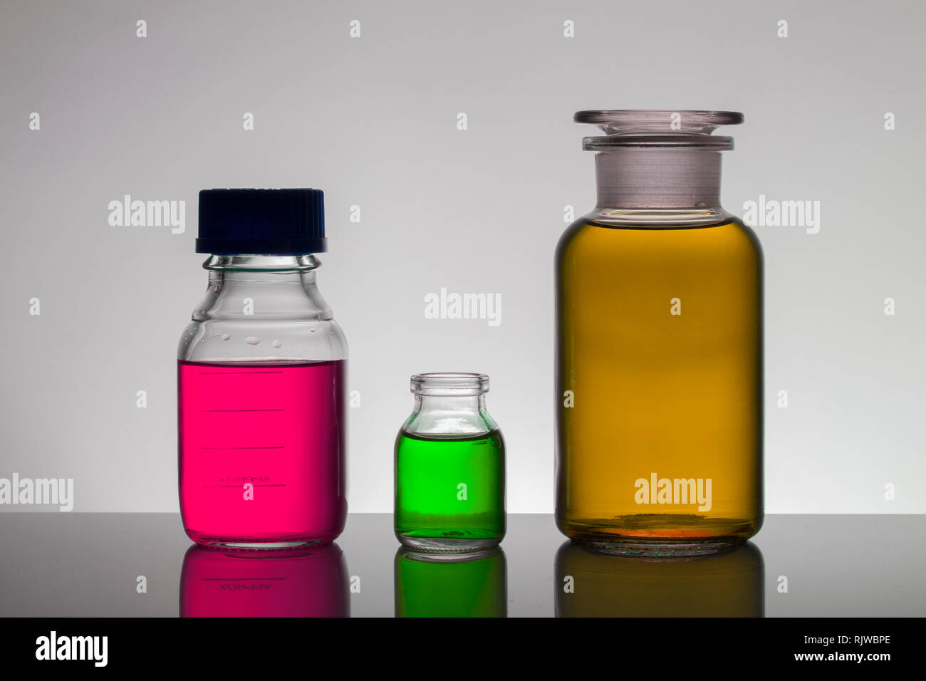 Liquid in laboratory bottles. Scientific biochemical laboratory ...
