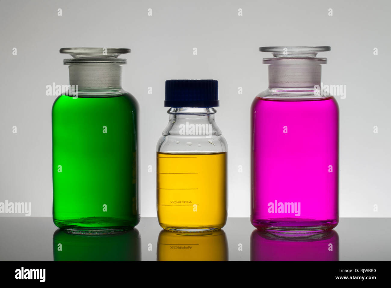 Liquid in laboratory bottles. Scientific biochemical laboratory ...