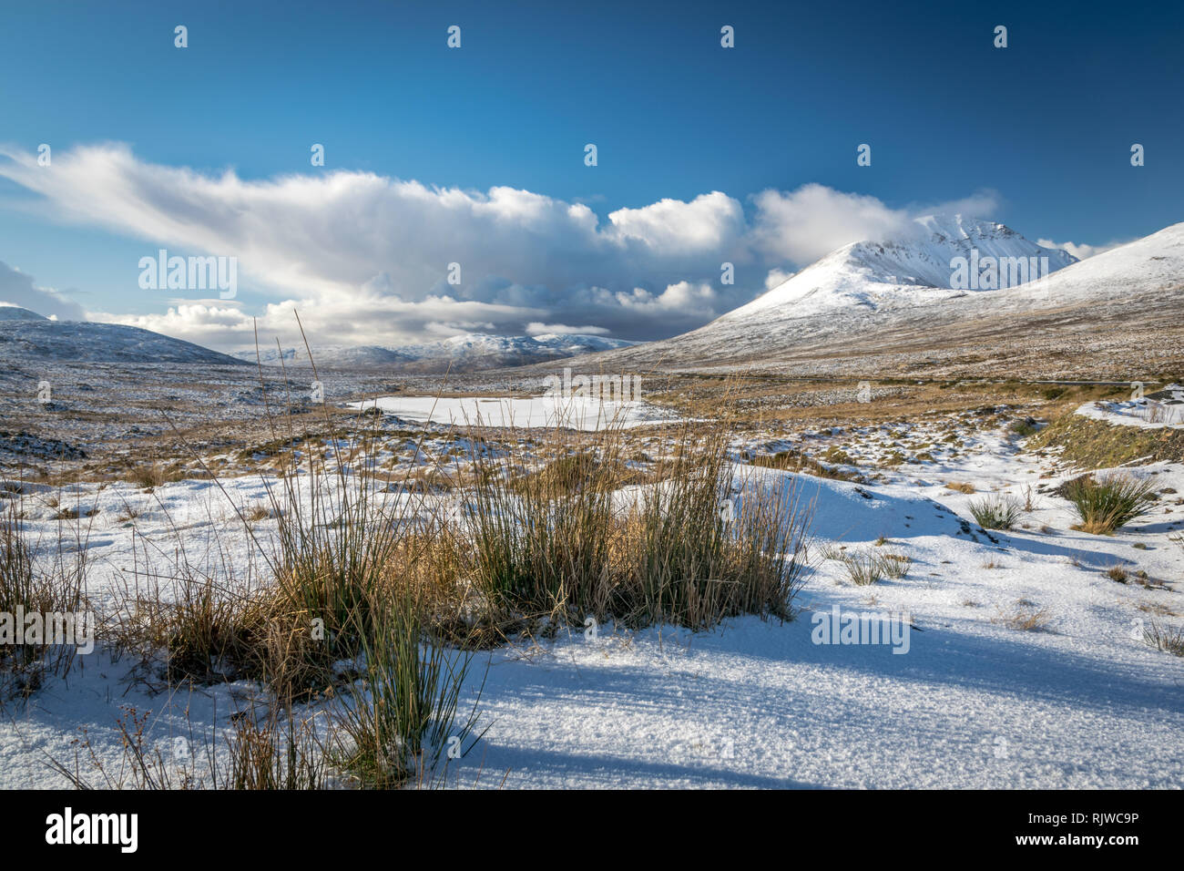 This is a winter scene of the mountains in Donegal Ireland. the ...