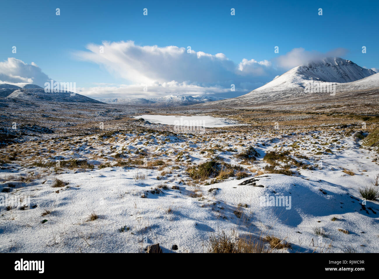 This is a winter scene of the mountains in Donegal Ireland. the ...