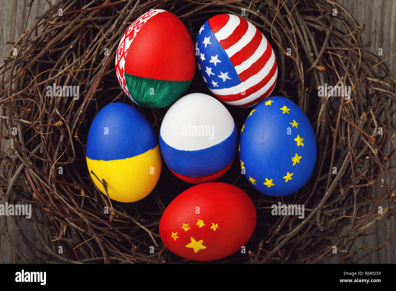 Easter eggs painted in colors of the flags of different states of the ...