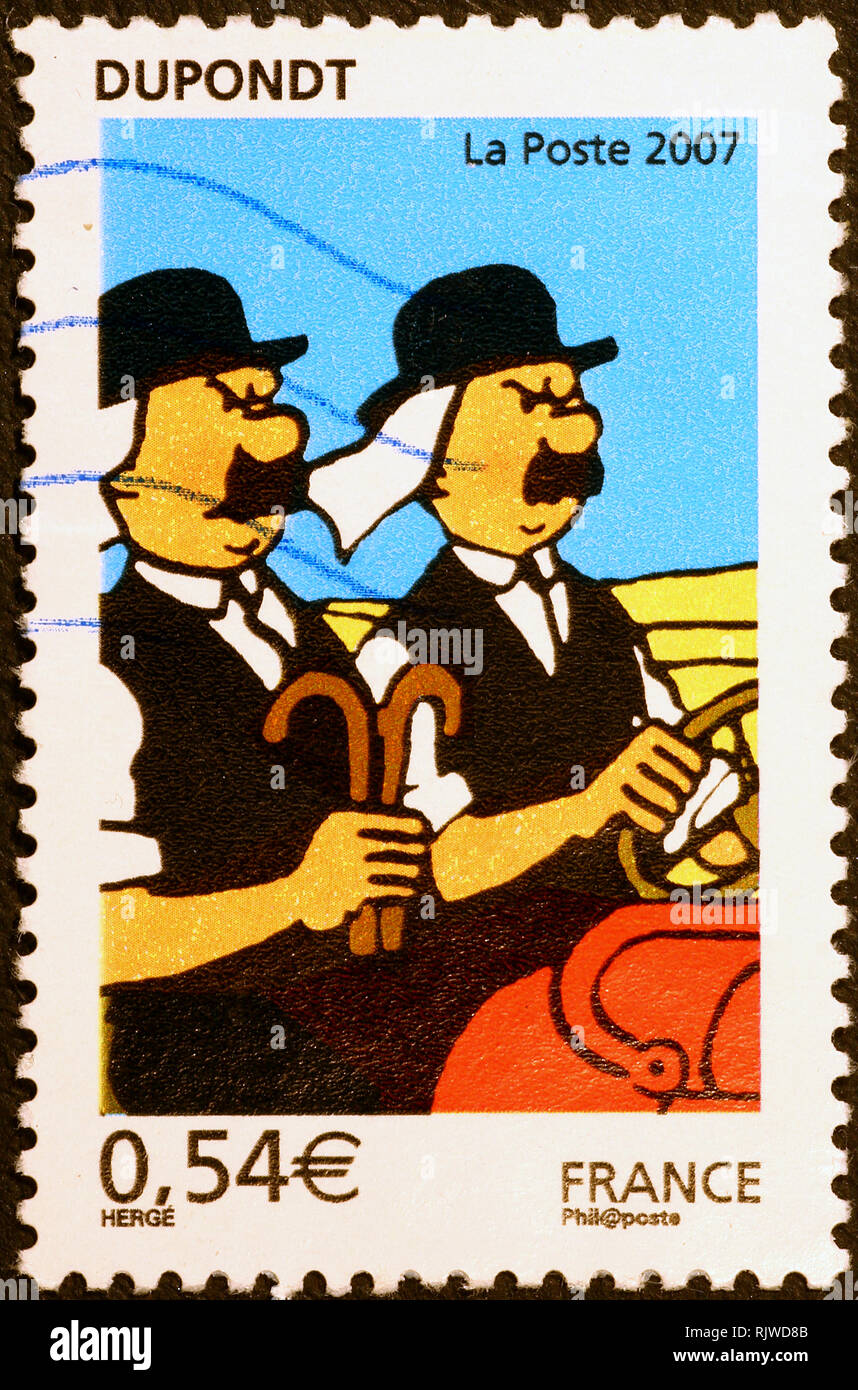 Characters of Tintin on french postage stamp Stock Photo - Alamy