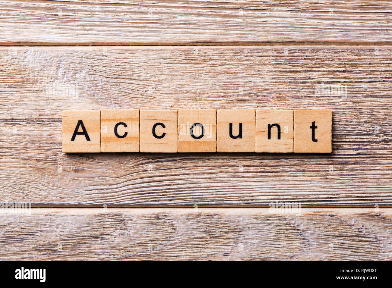Account word written on wood block. Account text on wooden table for ...