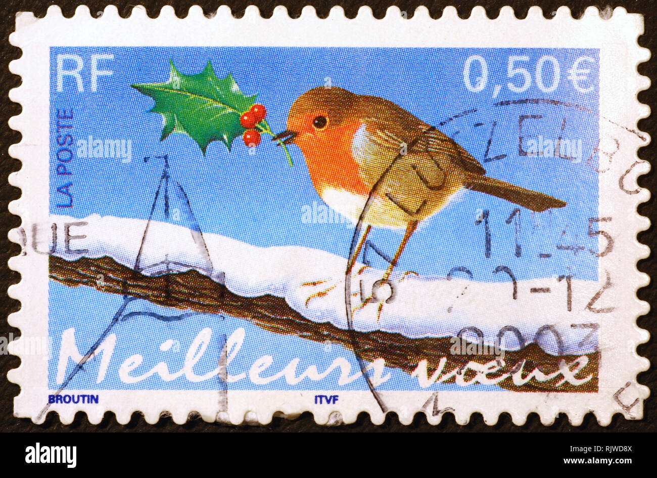 Christmas card with robin on french postage stamp Stock Photo - Alamy