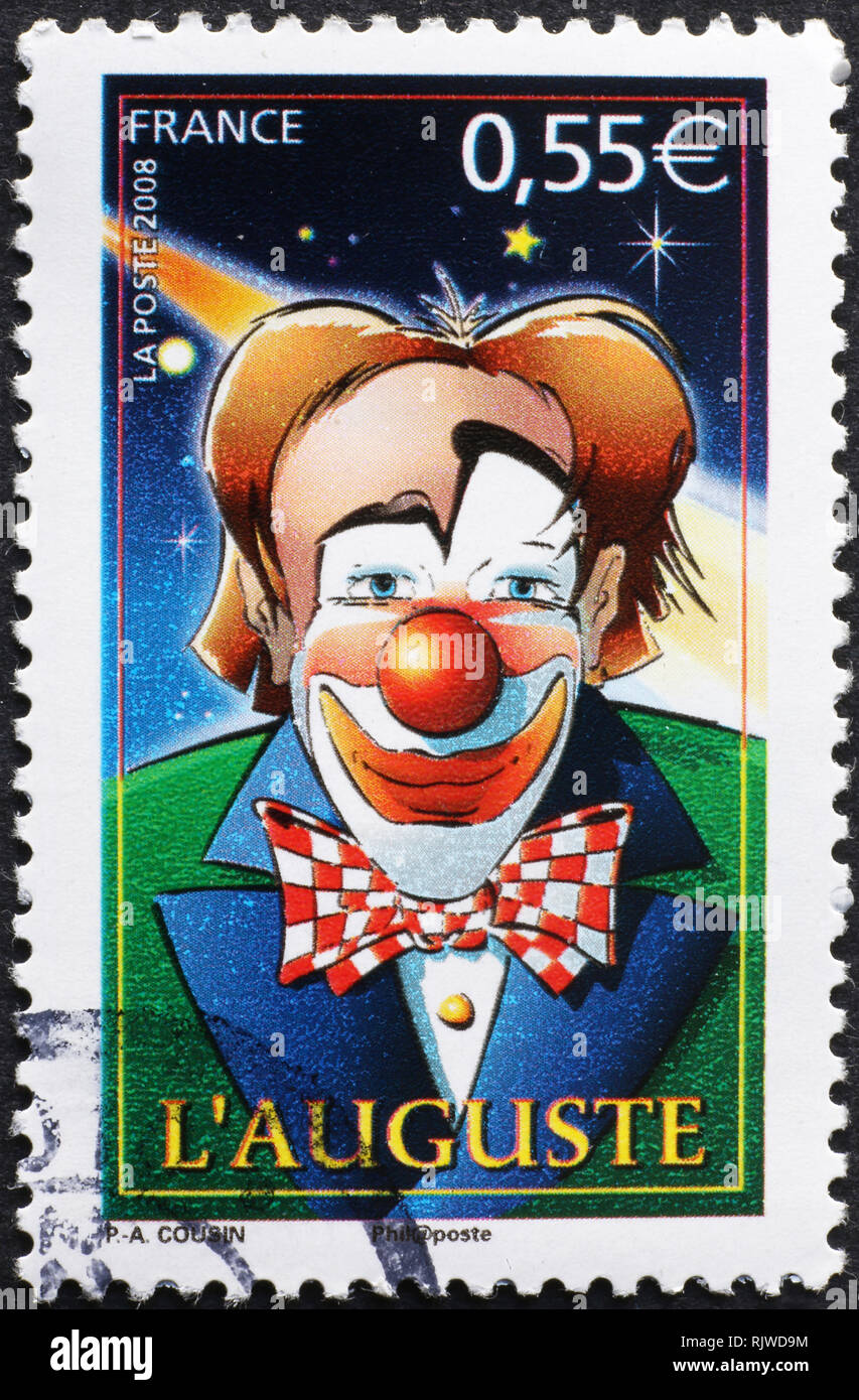 Clown on french postage stamp Stock Photo - Alamy