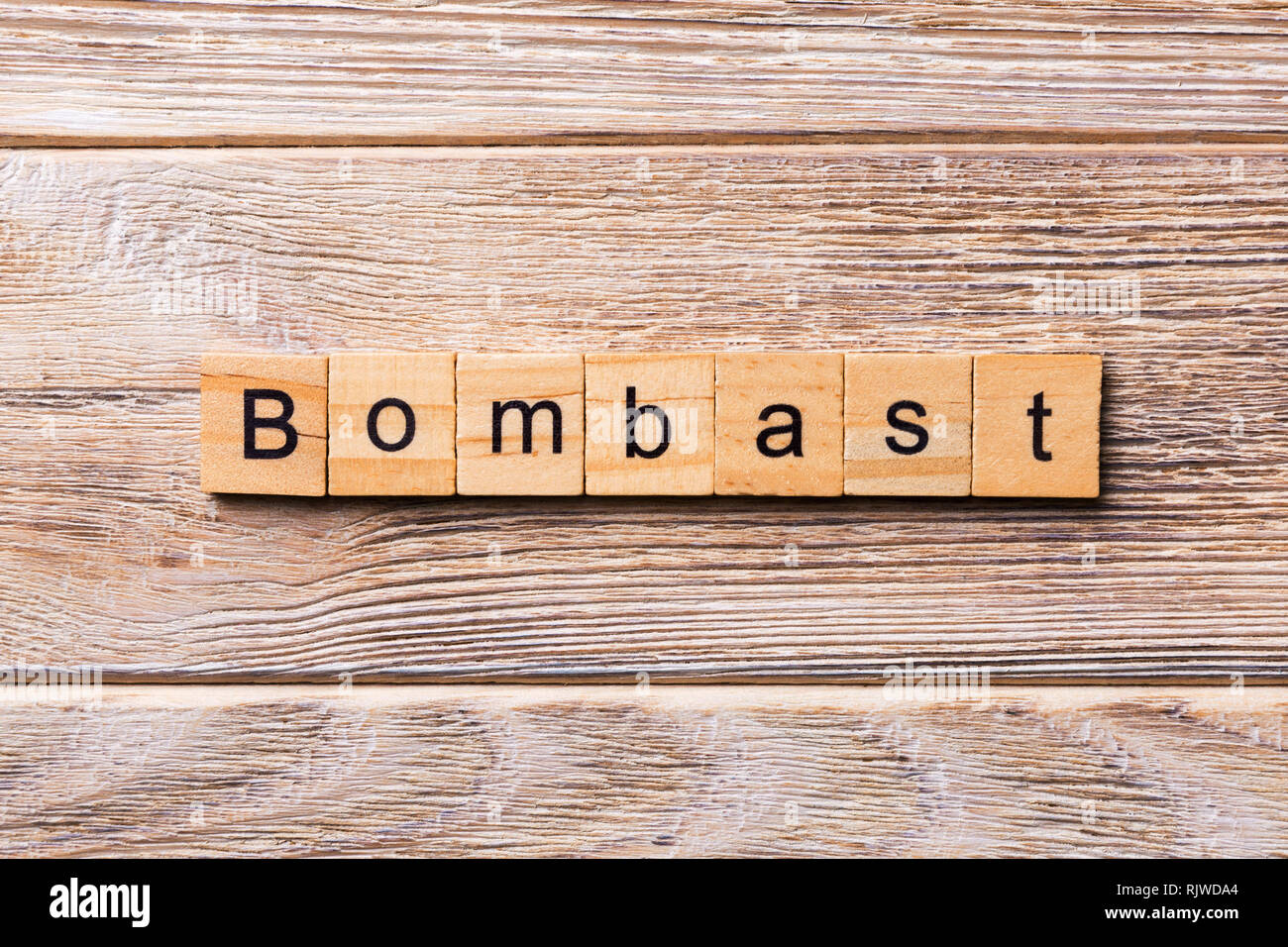 bombast word written on wood block. bombast text on wooden table for ...