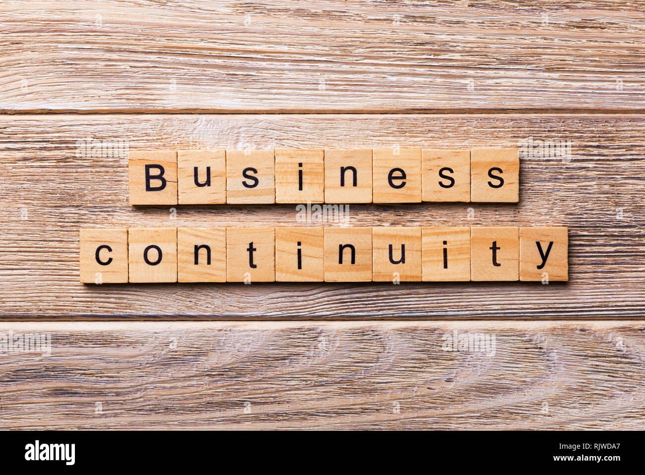 Business Continuity word written on wood block. Business Continuity ...