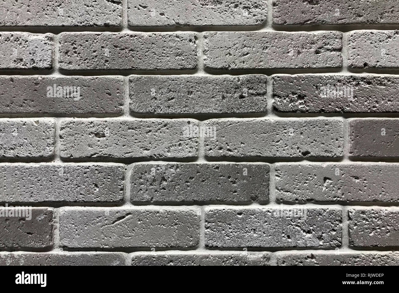 Stone wall with rectangle stones interior craft design Stock Photo - Alamy