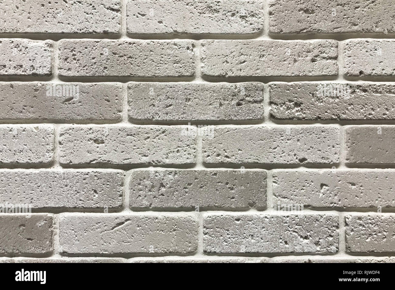 Grey brick wall texture background. Interior design concept with copy ...