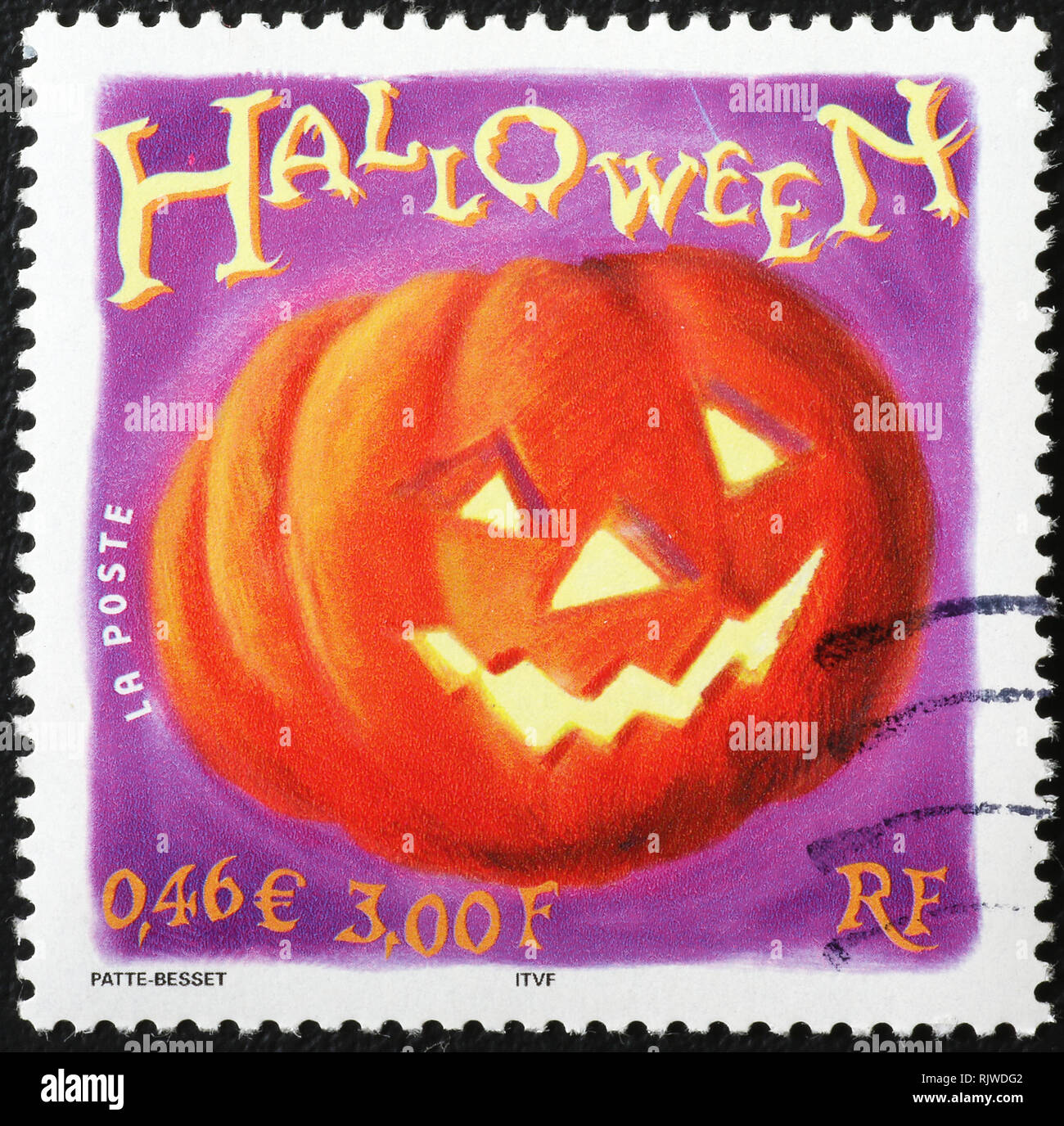 Halloween Jack-o'-lantern on french postage stamp Stock Photo - Alamy