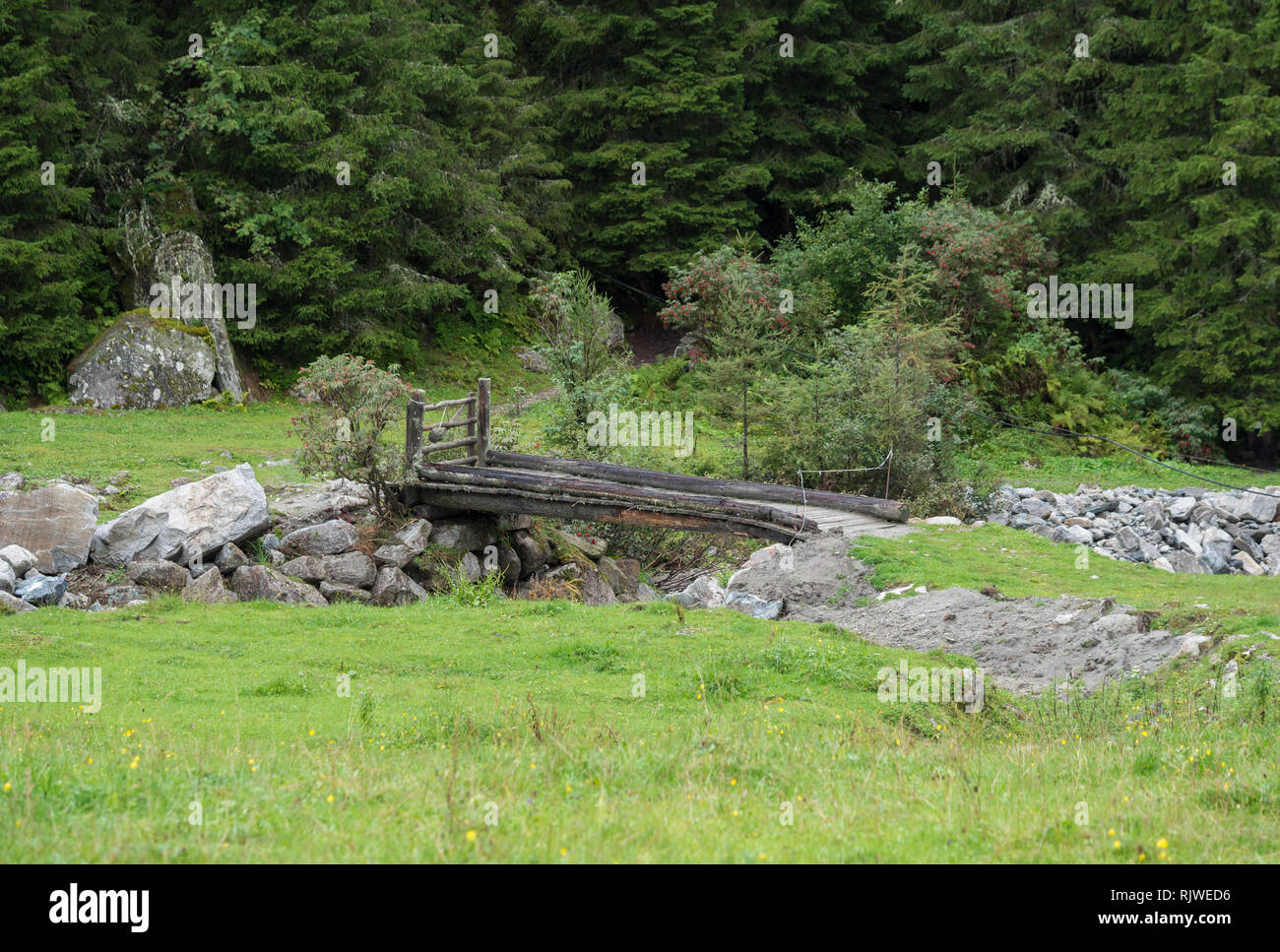 Bridge over creek Stock Photo - Alamy