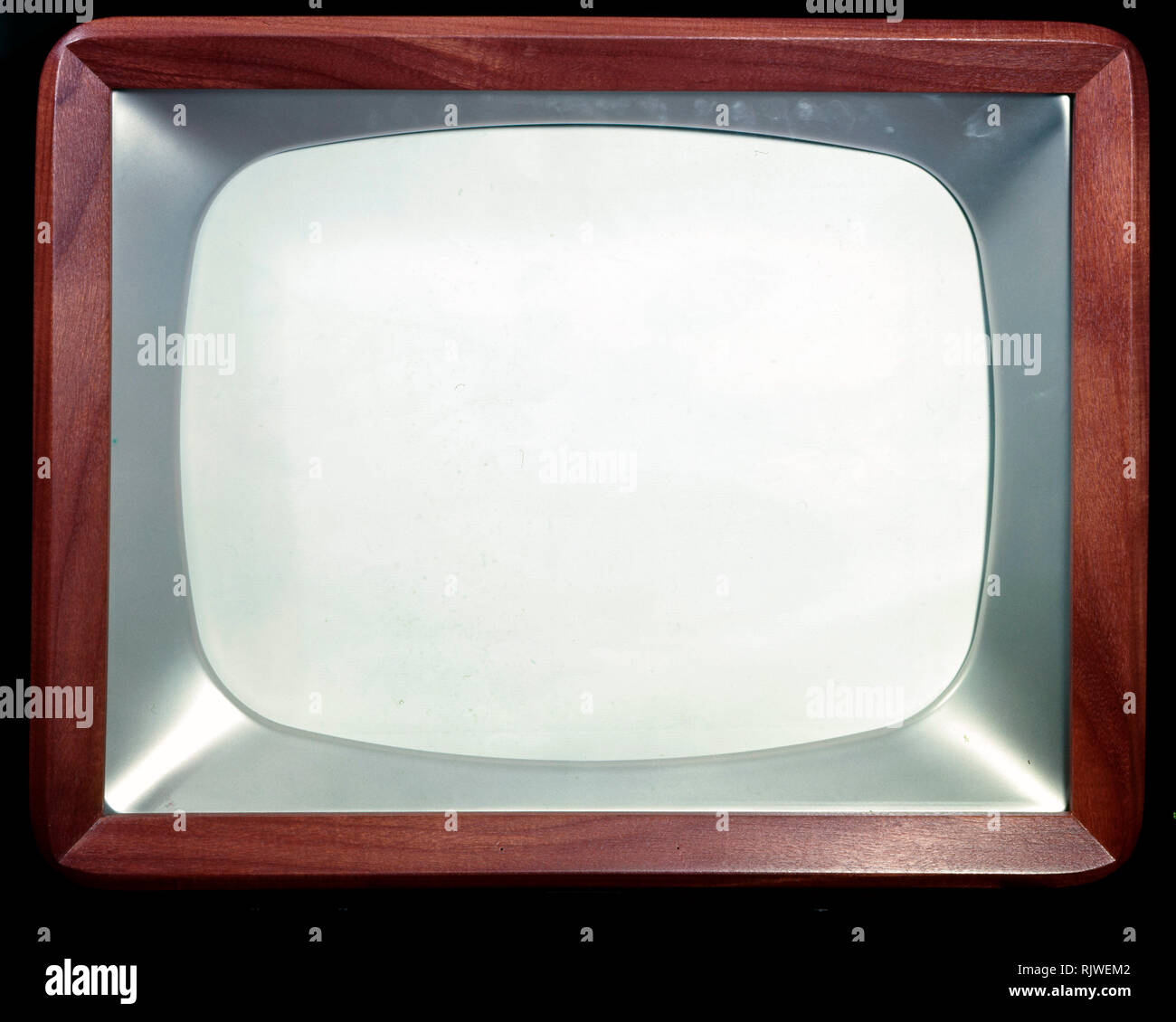 Television In The 1950s A Typical Tv Furniture In A Wooden Casing With A Small Tv screen 1958 television-in-the-1950s-a-typical-tv-furniture-in-a-wooden-casing-with-a-small-tv-screen-1958