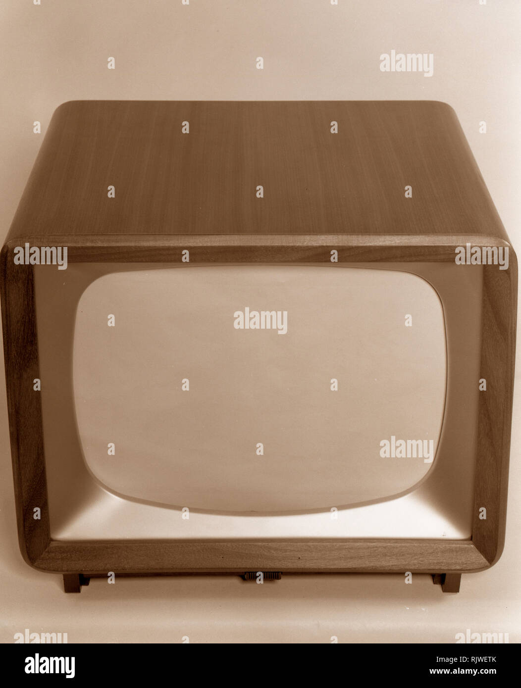 Television in the 1950s. A typical tv furniture in a wooden casing with ...