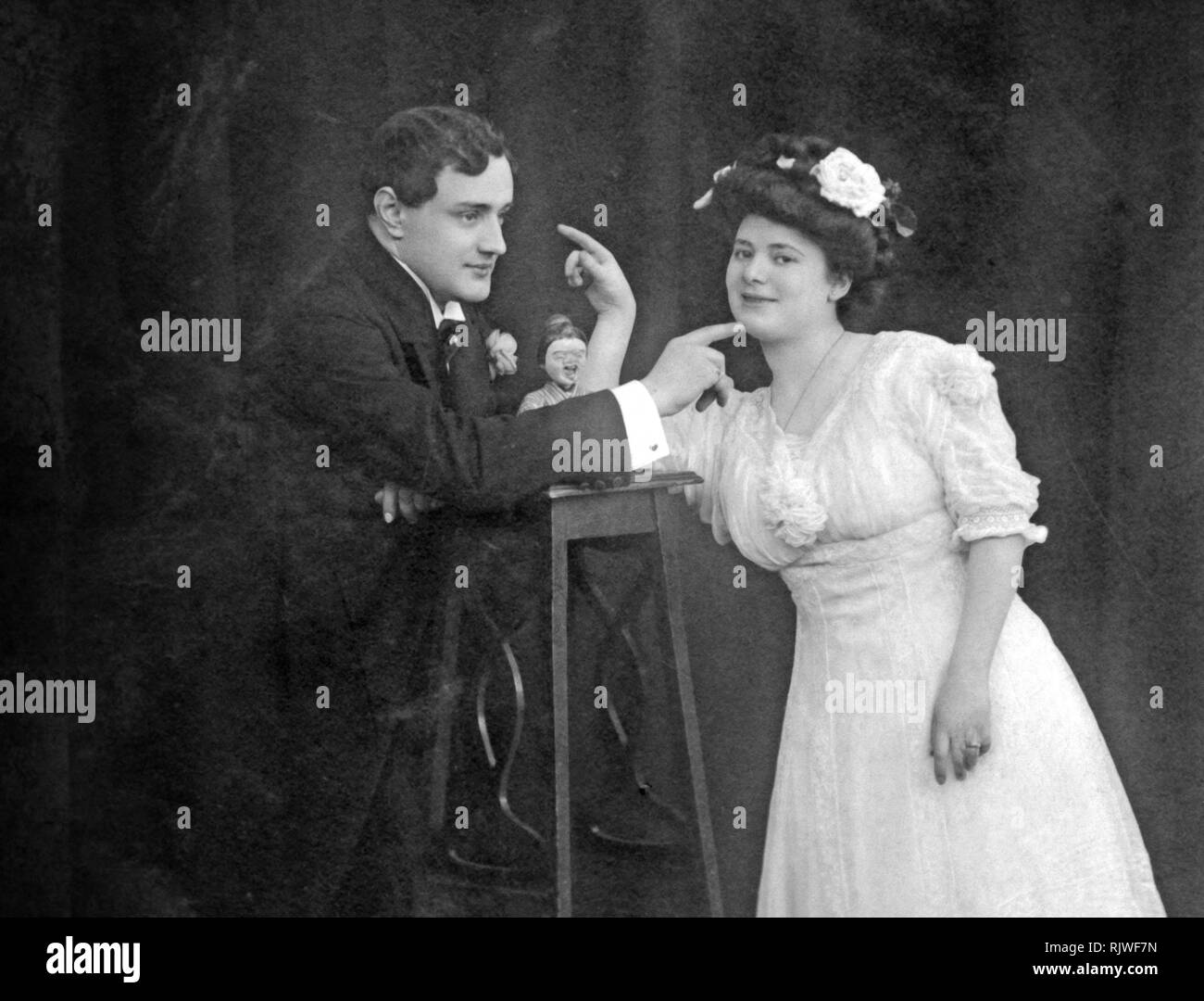Pair pointing finger at each other, ca. 1910s, Germany Stock Photo - Alamy