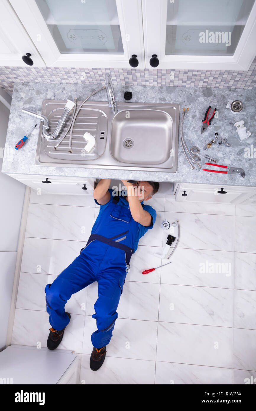 Professional plumber install pipes sink hi-res stock photography and ...