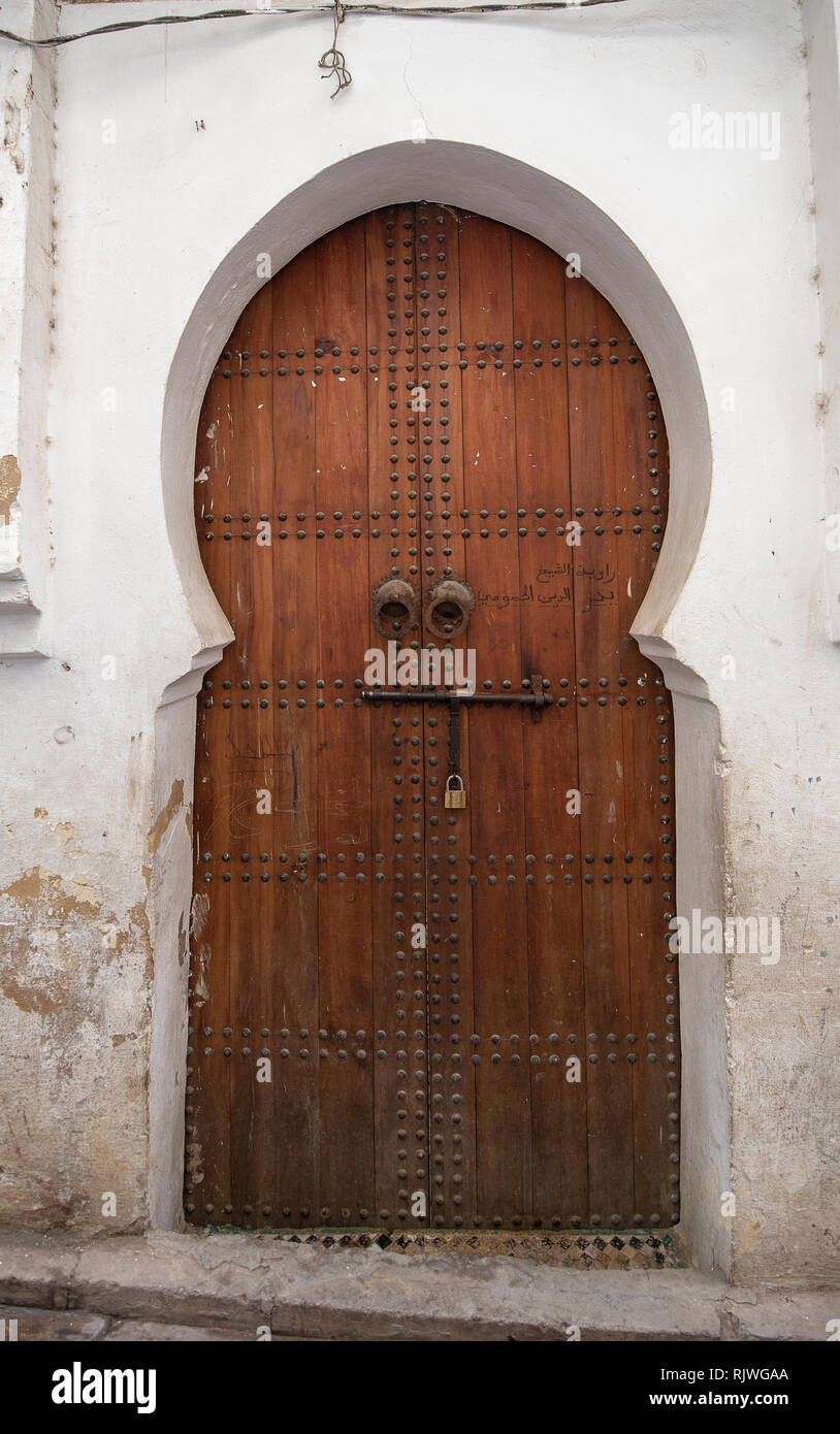 Traditional Moroccan style design of an ancient wooden entry door. In ...