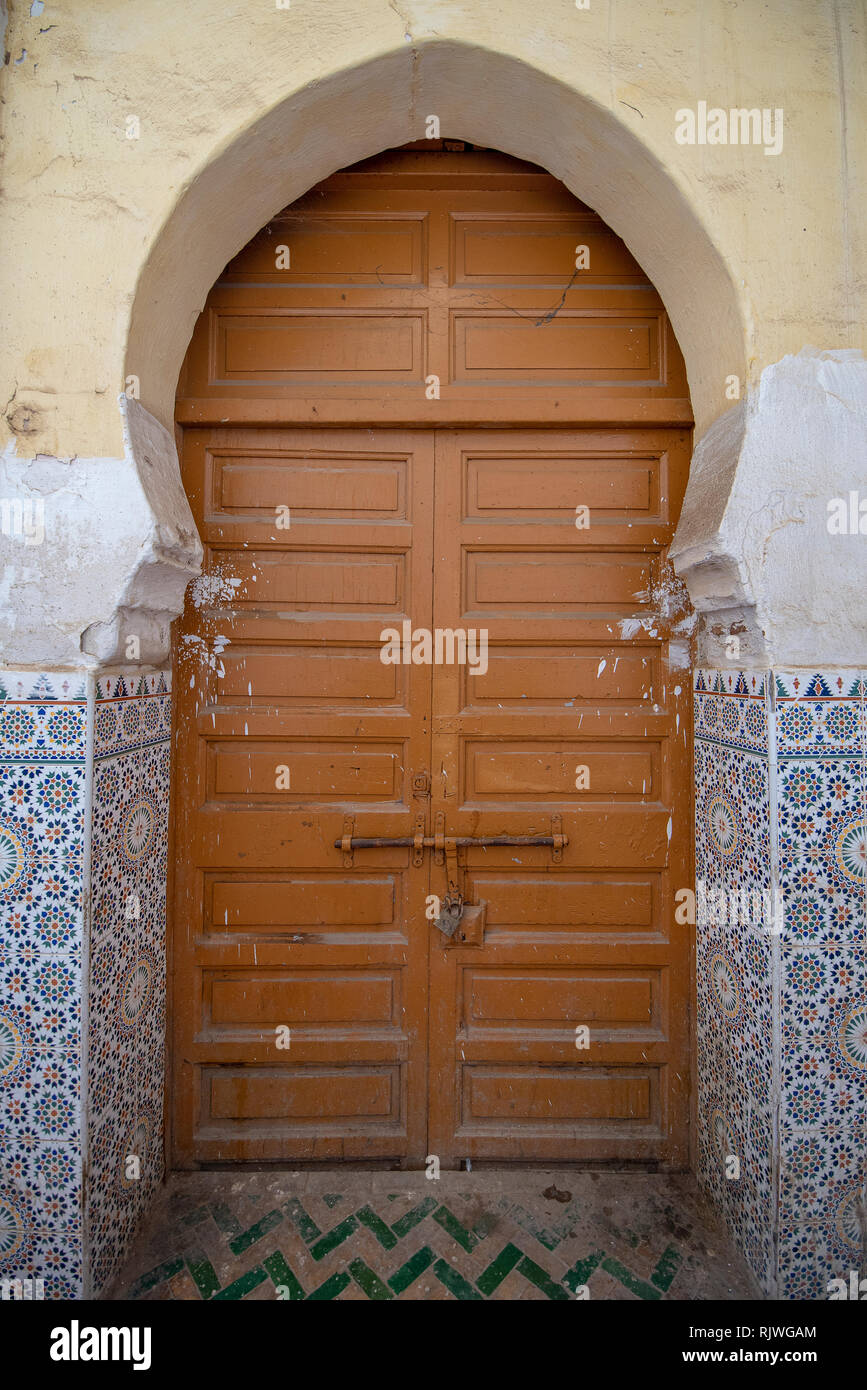 Traditional Moroccan style design of an ancient wooden entry door. In ...