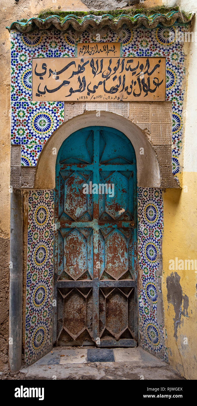 Traditional Moroccan style design of an ancient wooden entry door. In ...