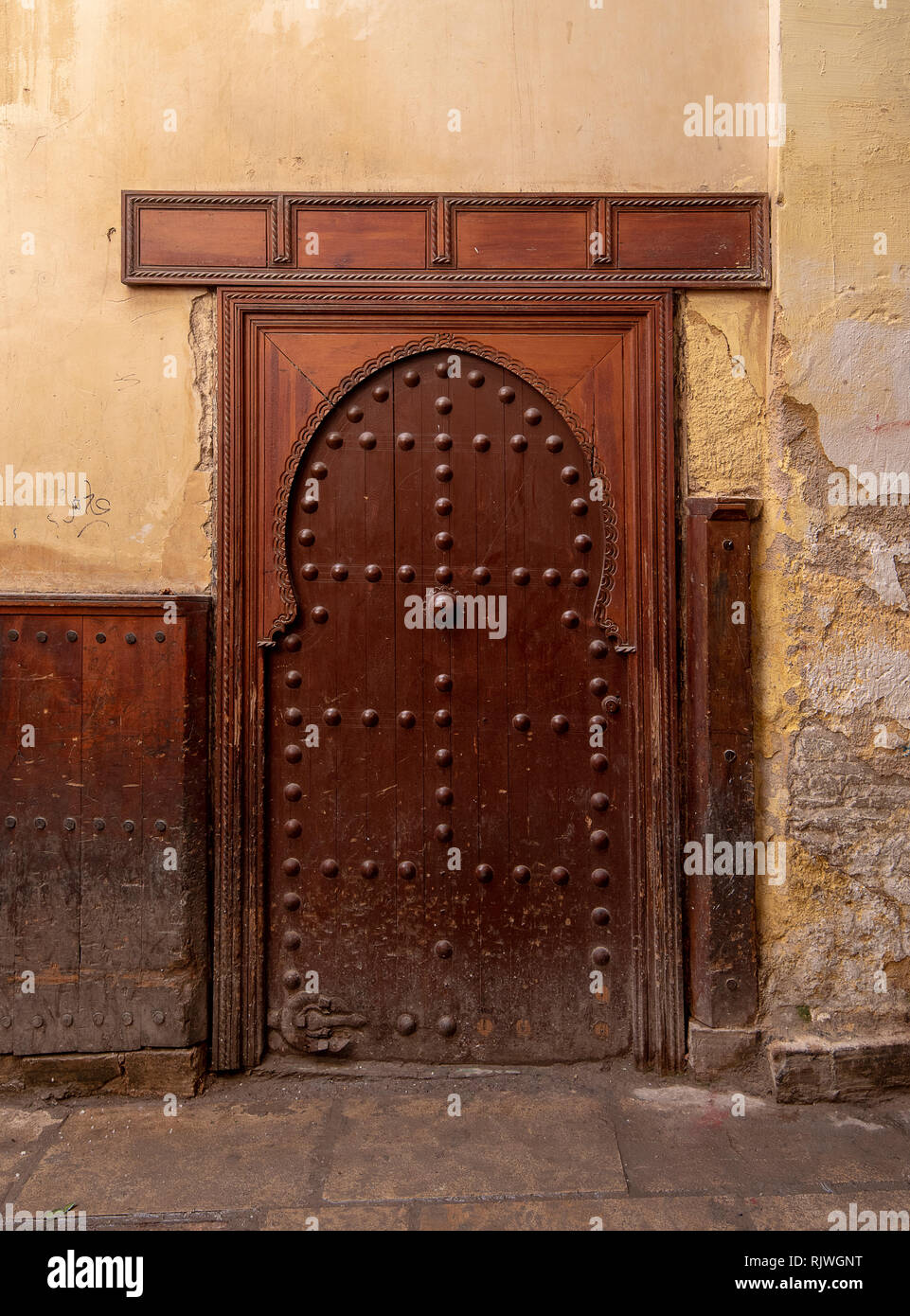 Traditional Moroccan style design of an ancient wooden entry door. In ...