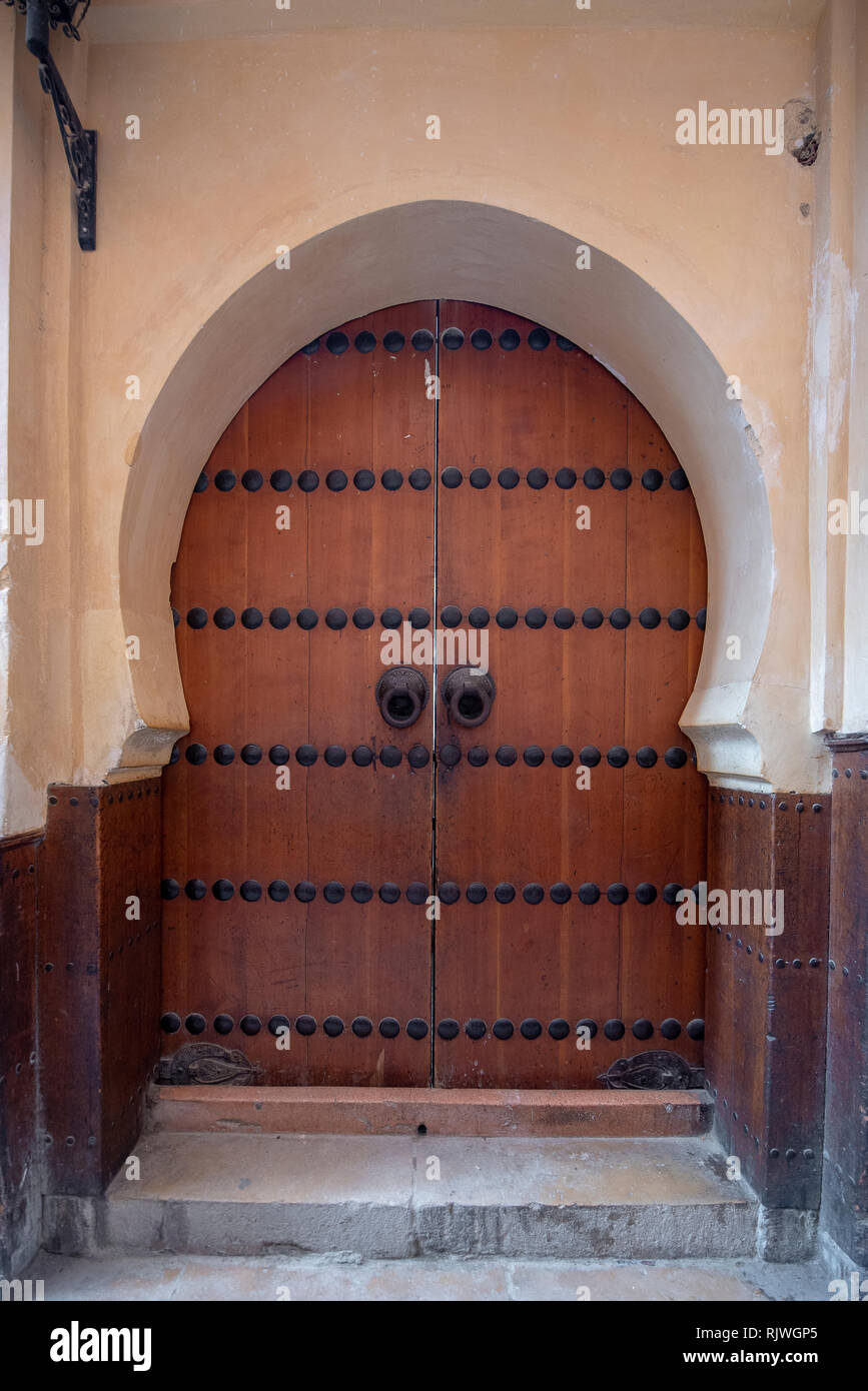 Traditional Moroccan style design of an ancient wooden entry door. In ...