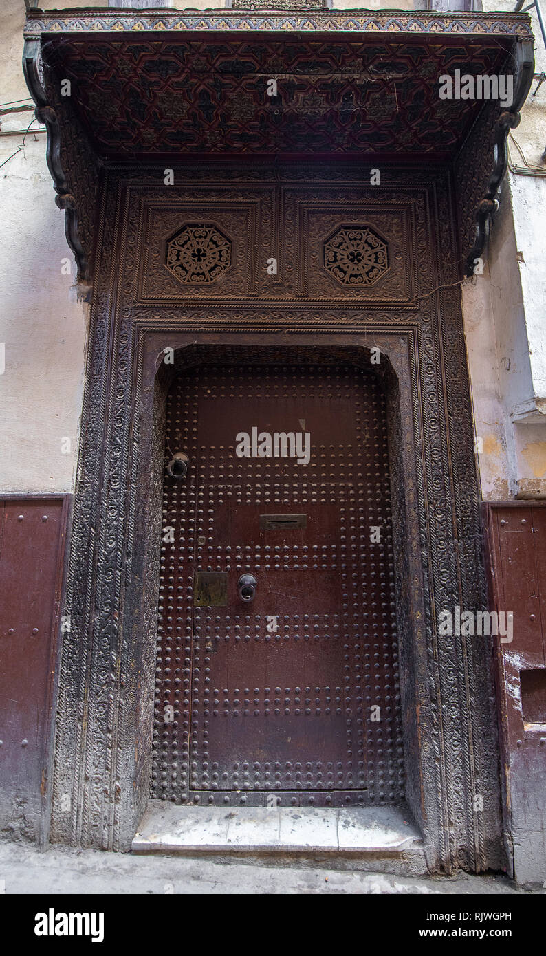 Traditional Moroccan style design of an ancient wooden entry door. In ...