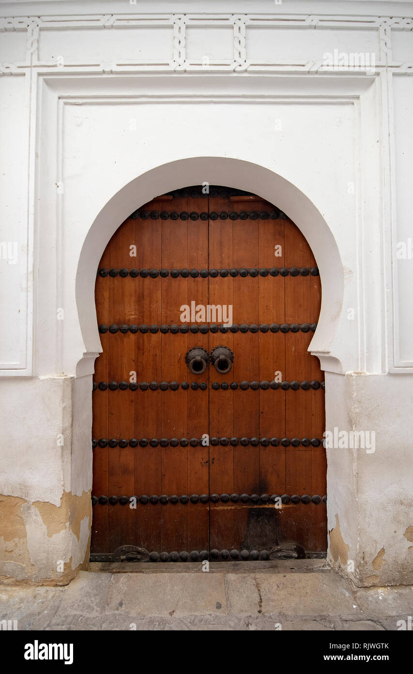 Traditional Moroccan style design of an ancient wooden entry door. In ...