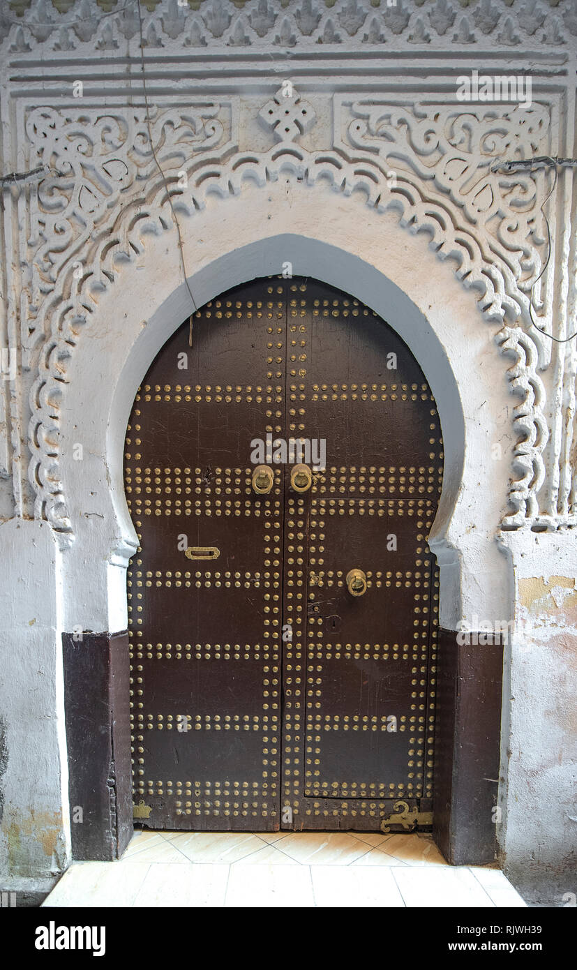 Traditional Moroccan style design of an ancient wooden entry door. In ...