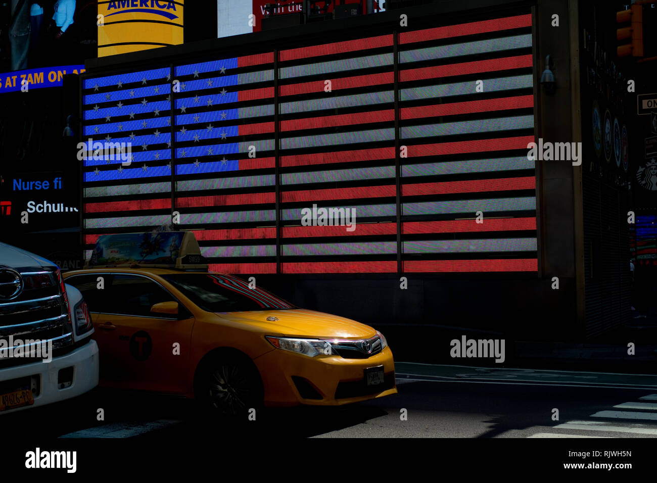 Yellow cab and american flag hi-res stock photography and images - Alamy