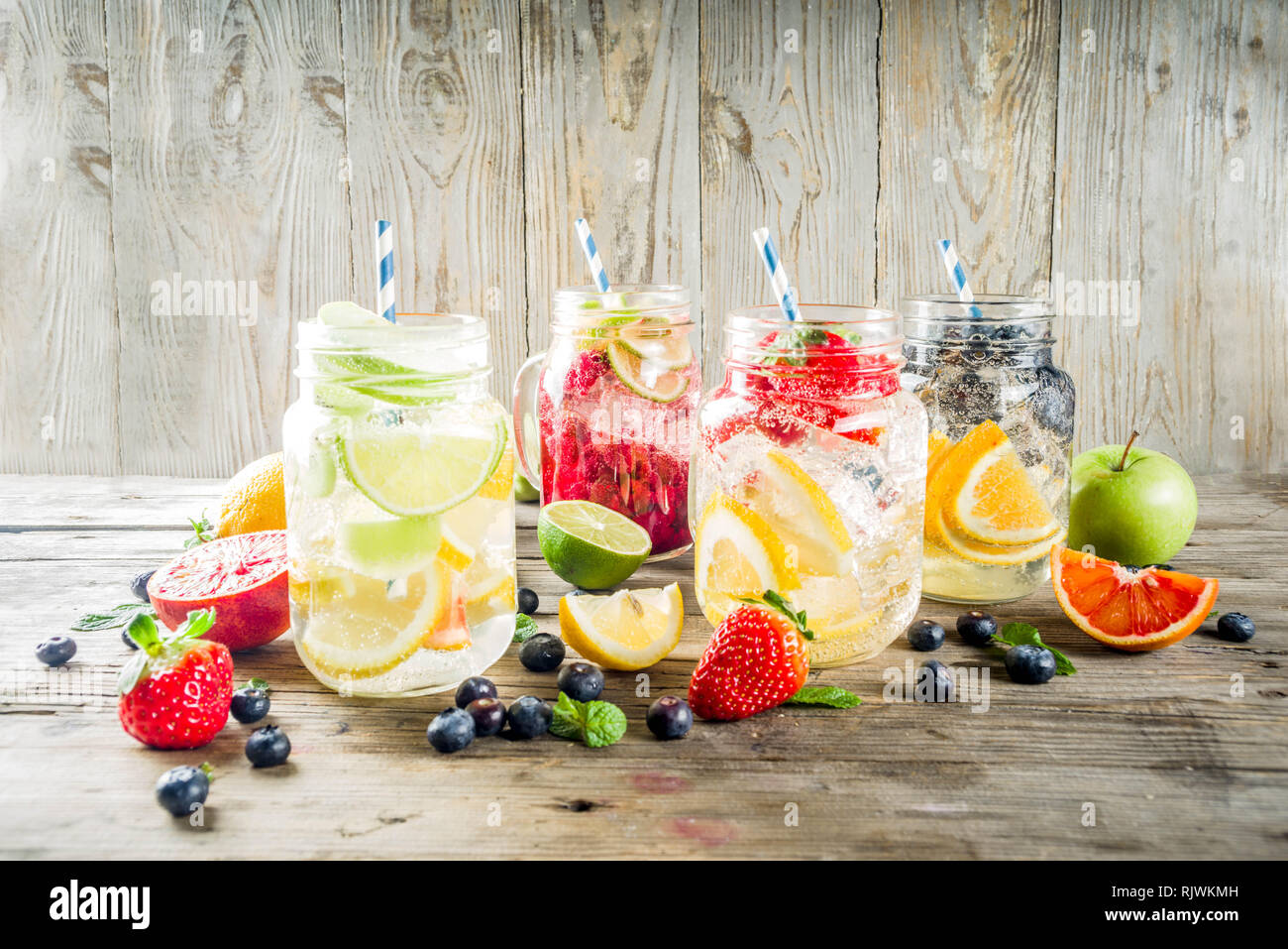 Selection various fruit and berry lemonade drinks, refreshment infused ...
