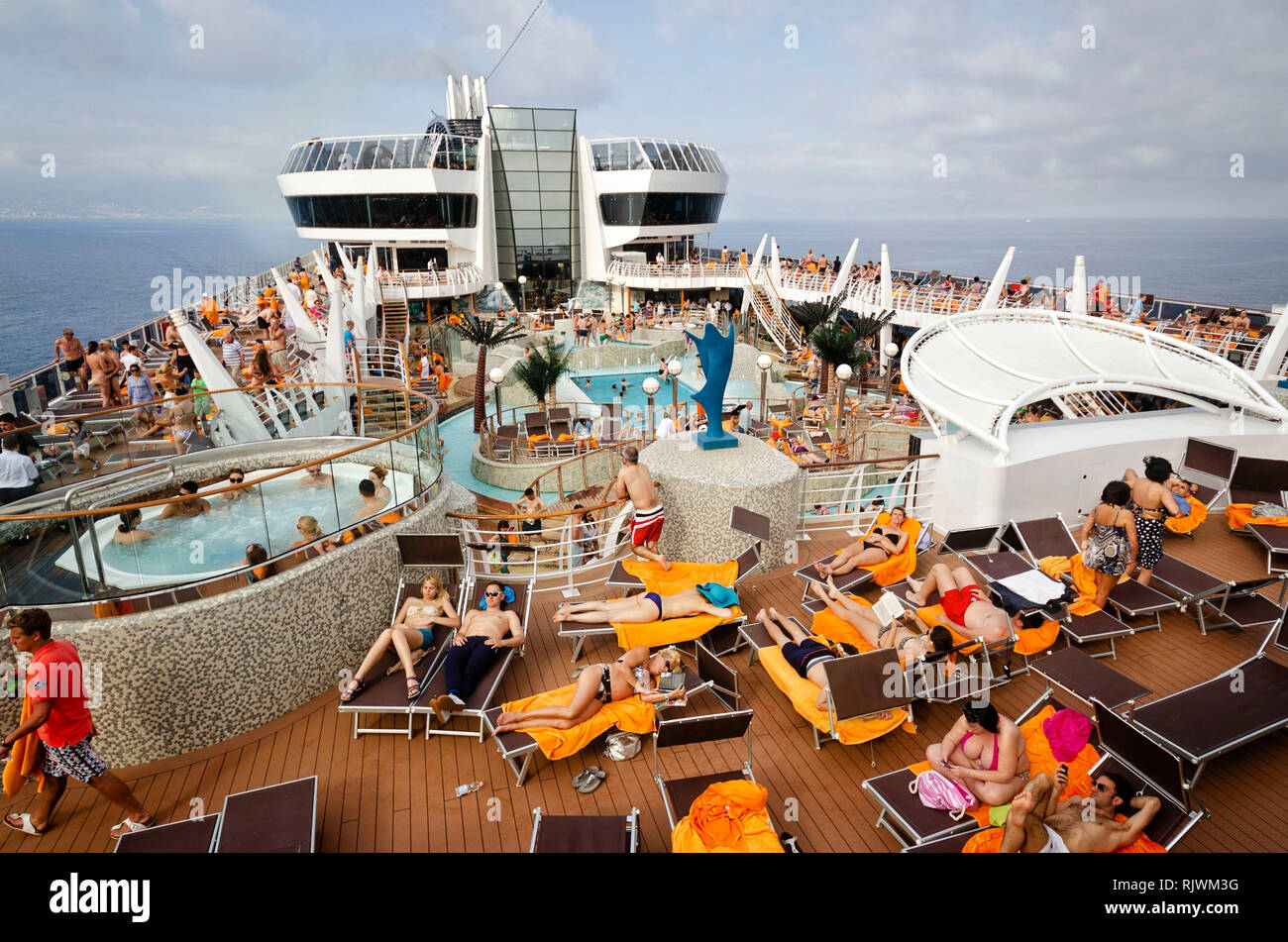 PASSENGER FERRY, MIDSEA, SPAIN - JUNE 09, 2012: Passengers enjoy at ...