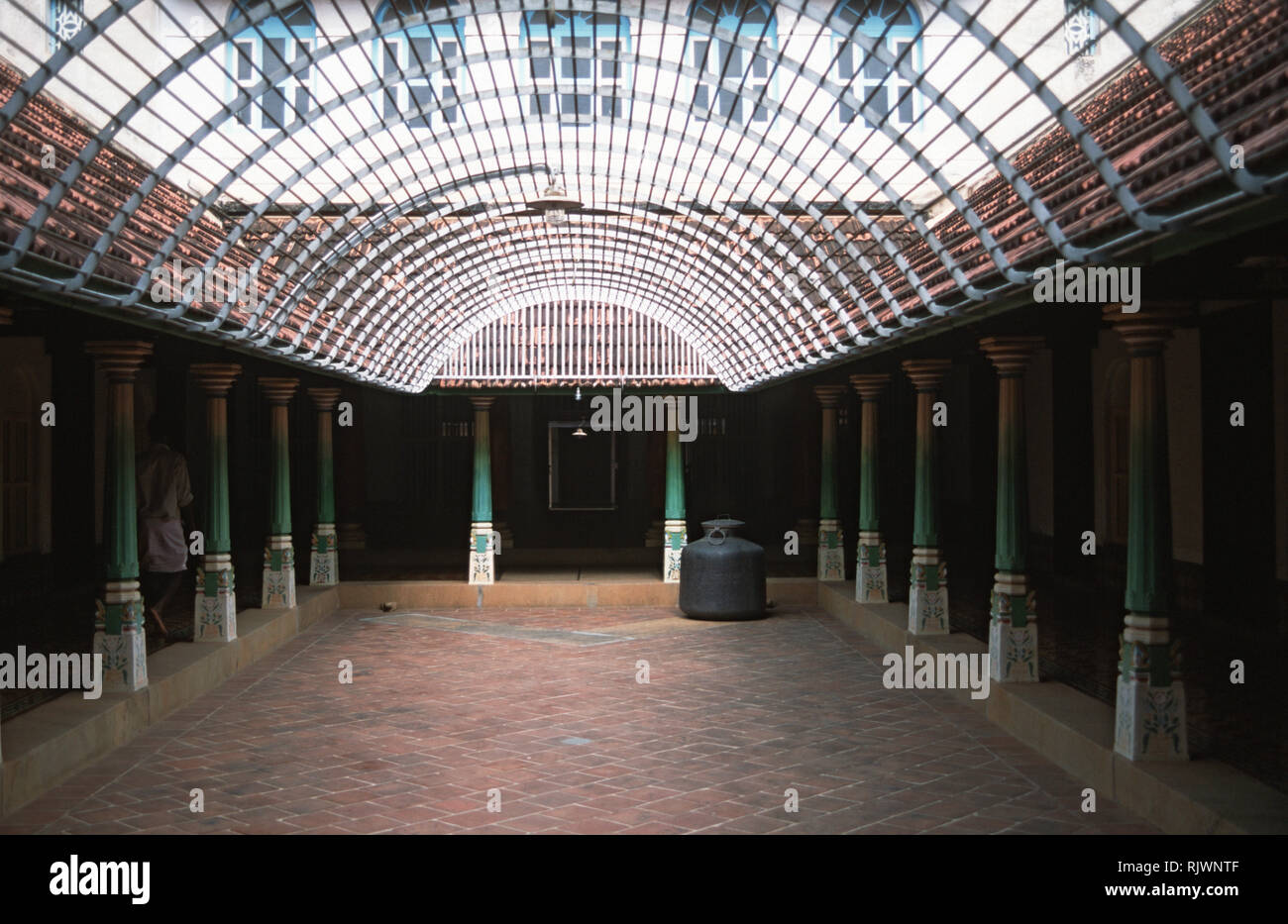 The inner courtyard of an old mansion in Chettinad. Once home to the ...