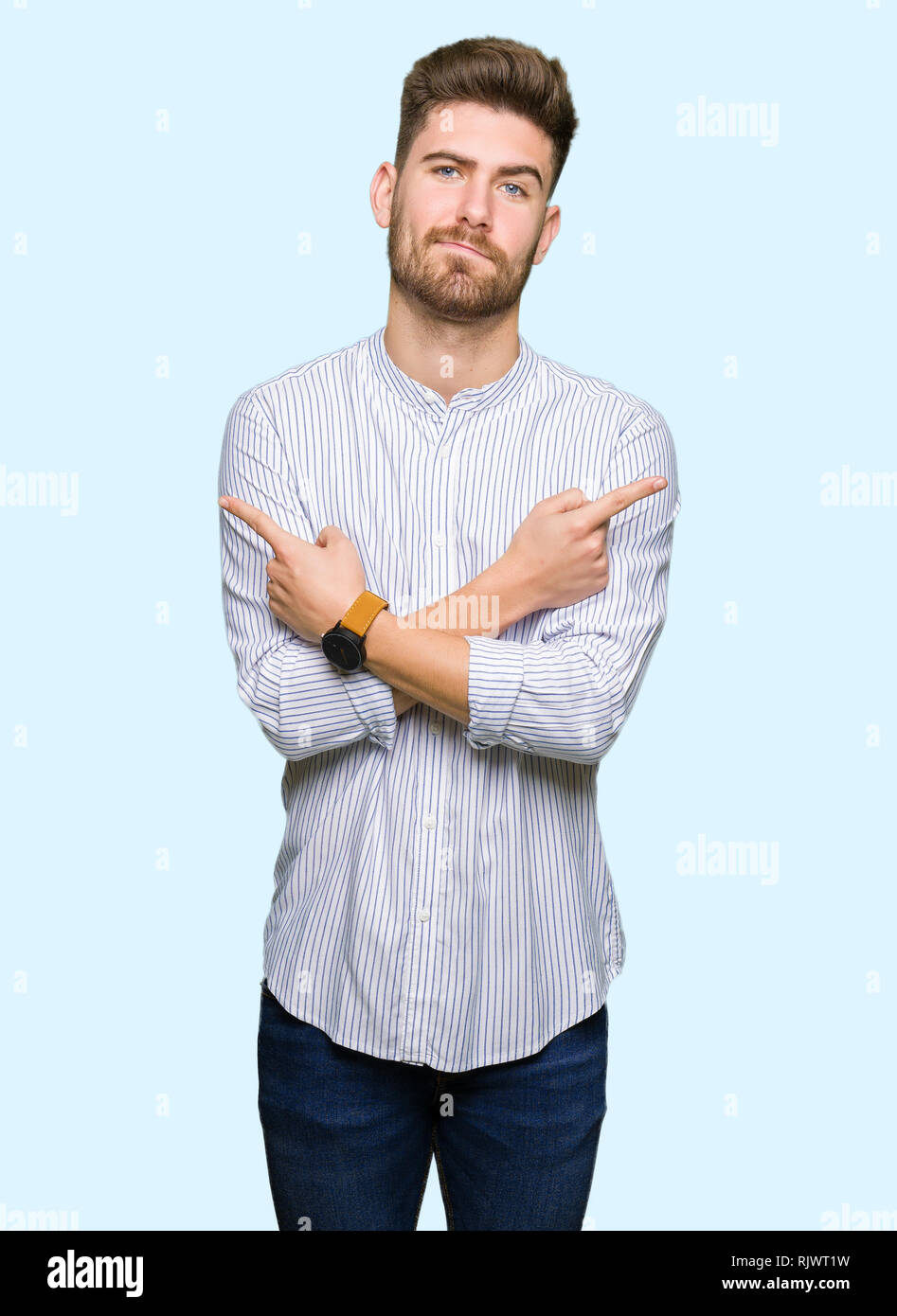 Pointing two ways hi-res stock photography and images - Alamy