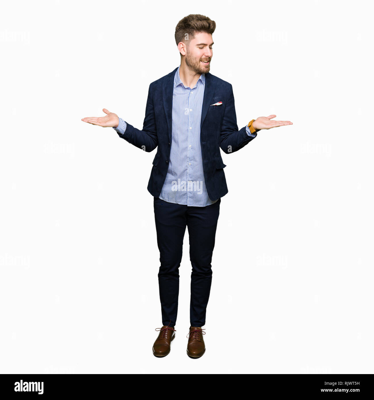 Man presenting open hands smiling Cut Out Stock Images & Pictures - Alamy